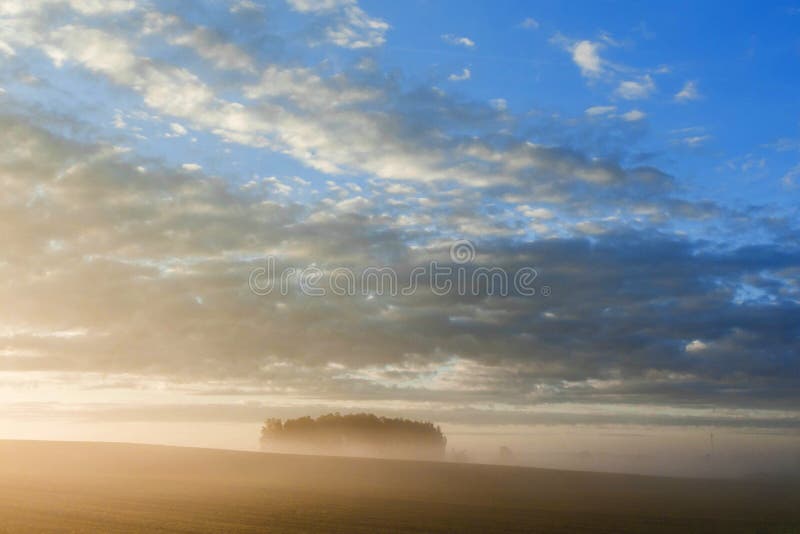 Dawn at the field stock photo. Image of light, clouded - 4394084