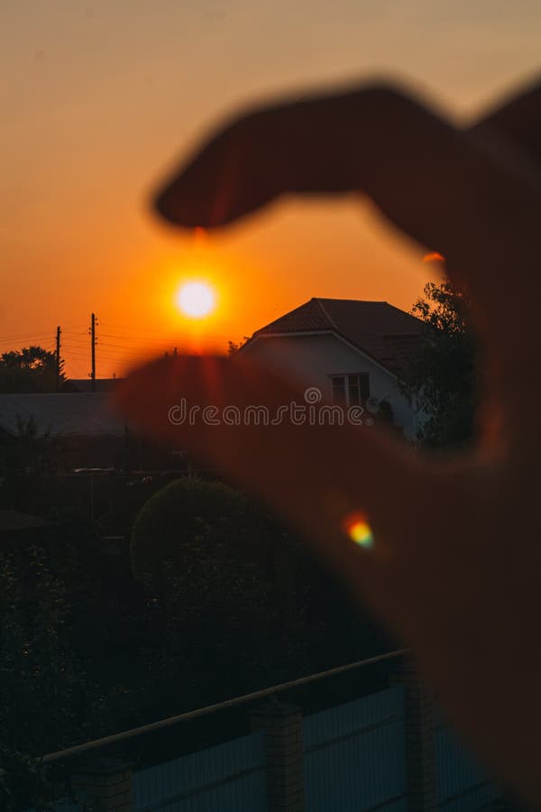 Dawn in hand stock photo. Image of dawn, night, sunset - 190983320