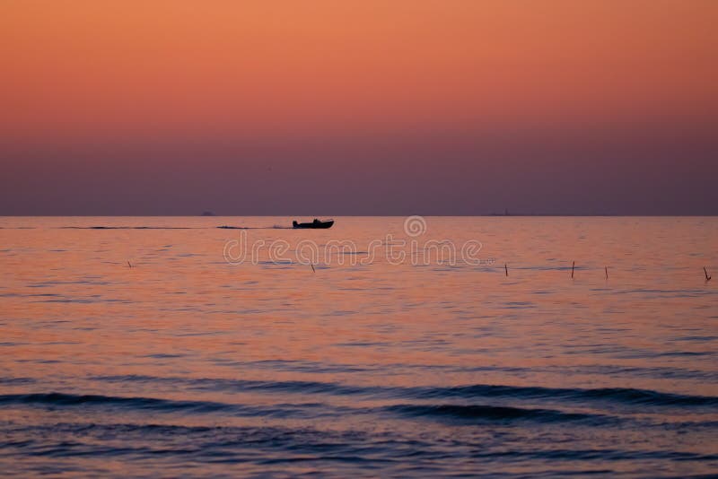 At Dawn in the Morning, a Ship Floats on the Sea Stock Image - Image of ...