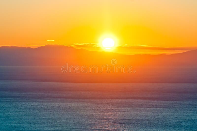 Dawn over the sea stock photo. Image of mountain, clouds - 17824884