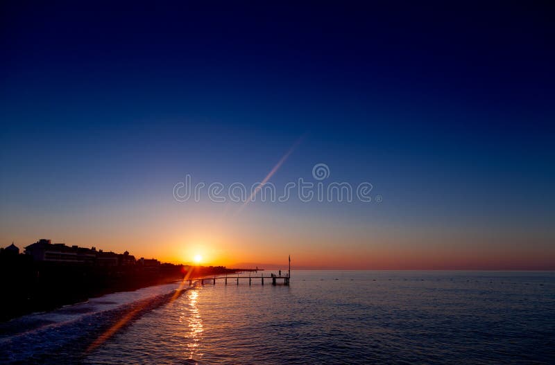 Dawn over the sea stock image. Image of idyllic, reflection - 83676119