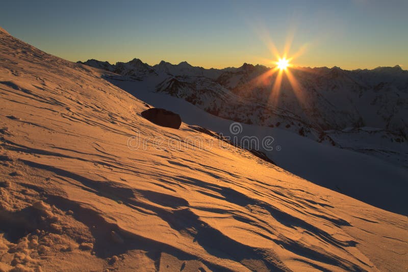 Dawn Over the Snow-capped Mountains Stock Photo - Image of alpine ...