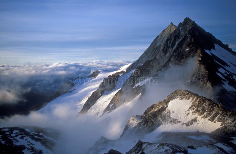Dawn over the Swiss Alps stock photo. Image of white, high - 4229040