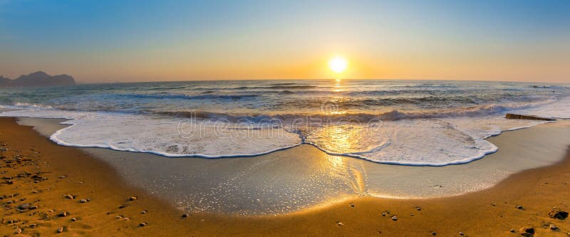 Dawn by the sea stock photo. Image of sunlight, backdrop - 165594758