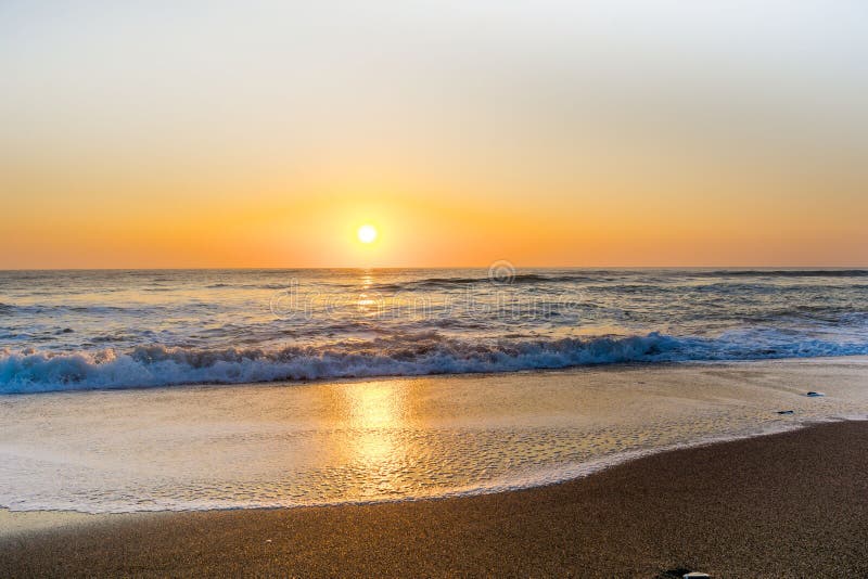 Dawn by the sea stock photo. Image of sunset, sunny - 166474528