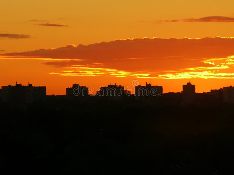 Dawn Skyline stock image. Image of sunrise, orange, city - 245573