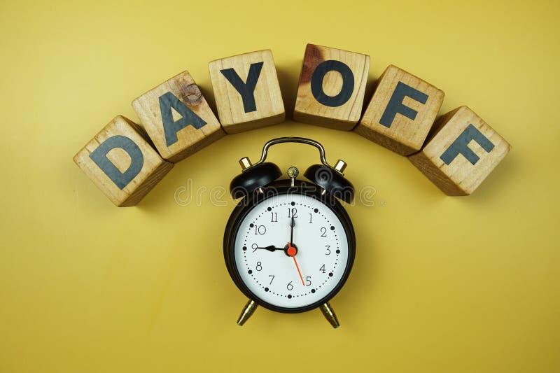 Day Off Word and Alarm Clock Top View on Yellow Background Stock Image ...
