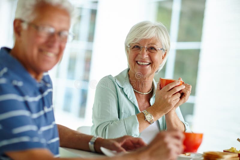 The Day Starts with Coffee. a Senior Couple Eating Breakfast. Stock ...