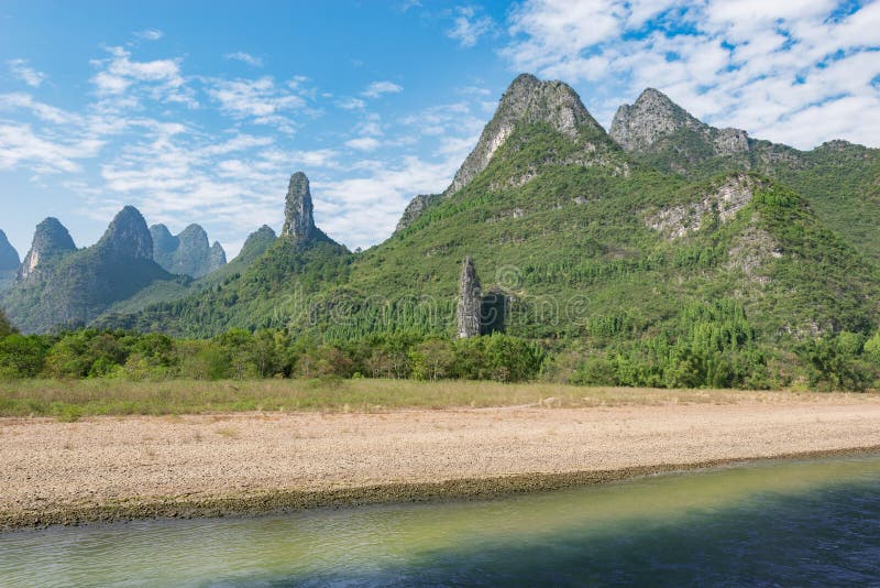 Day View of Karst Hills by Li River Stock Photo - Image of park, creek ...