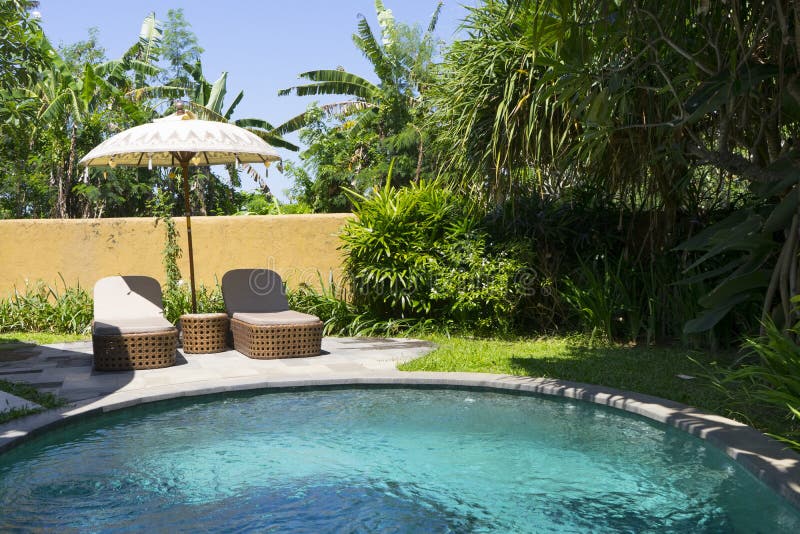 Daybed beside the pool stock image. Image of holiday - 97882255