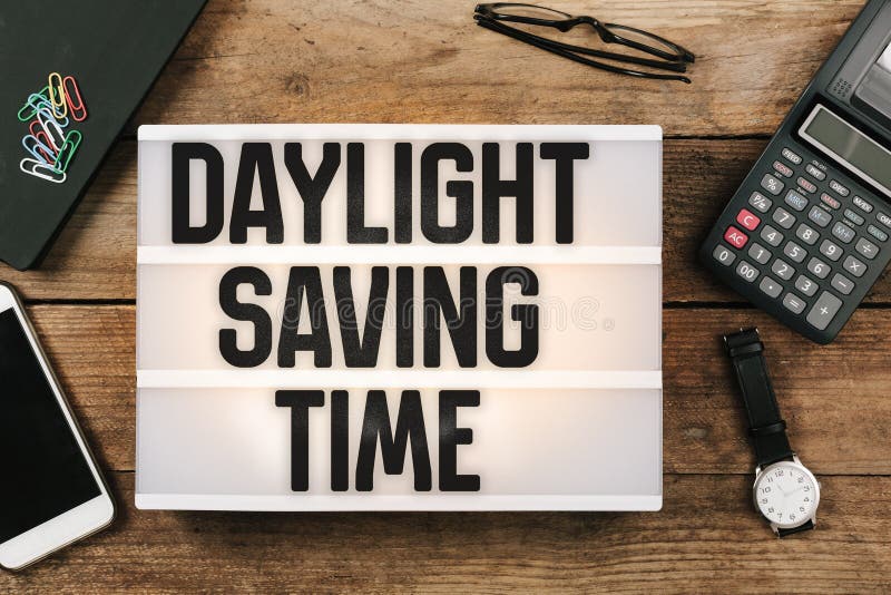 Daylight Saving Time in Vintage Style Light Box on Office Deskt Stock ...