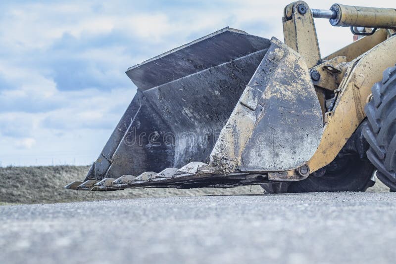 Daylight Yellow Loader with a Bucket. There is a Tint Stock Image ...