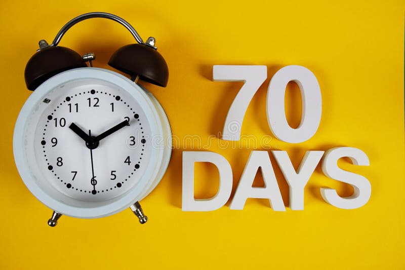 70 Days Alphabet Letters with Alarm Clock on Yellow Background Stock ...