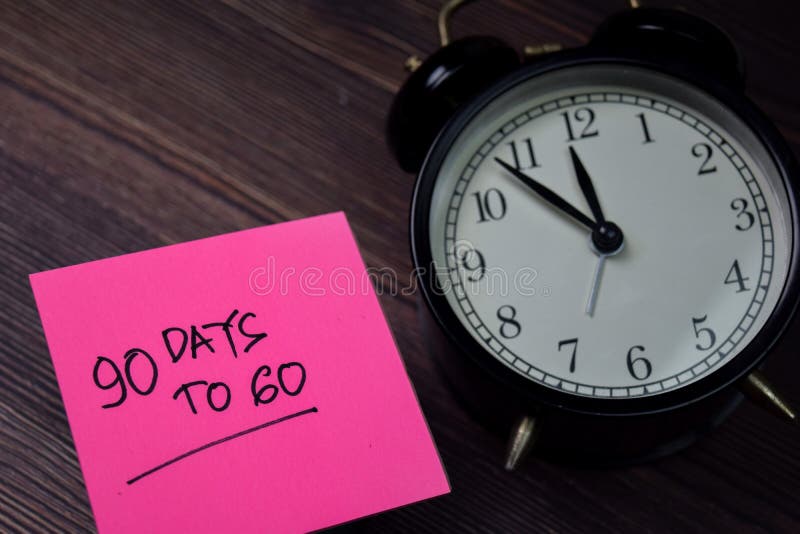 Concept of 90 Days To Go Write on Sticky Notes Isolated on Wooden Table ...