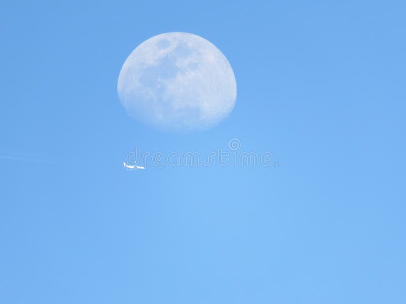 Daytime Moon with Airplane Flying Beneath Stock Image - Image of nature ...