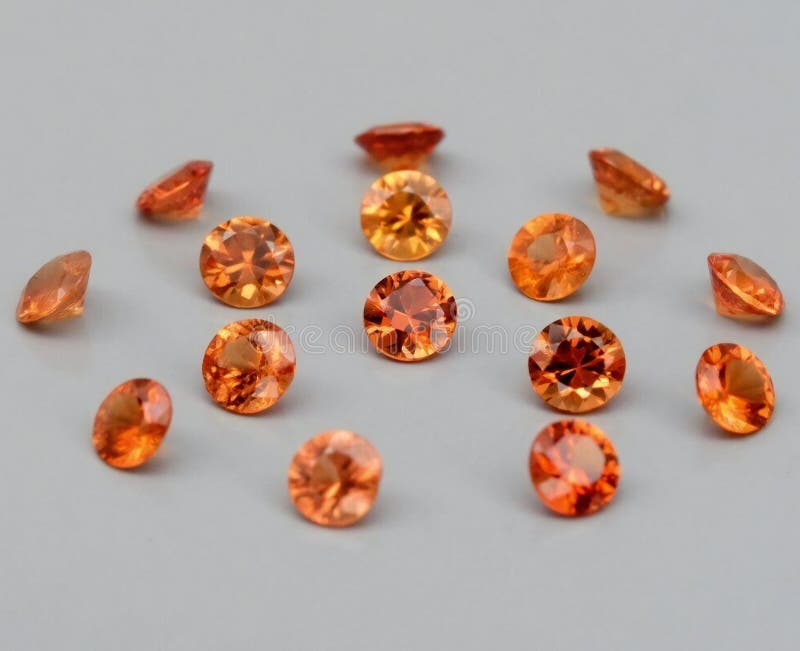 A Dazzling Display of Brilliant Orange Gemstones Captivating Light ...