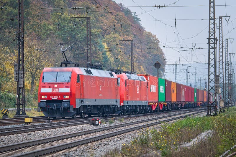 DB Cargo Class 185 Electric Locomotive Pulls a Freight Train through ...