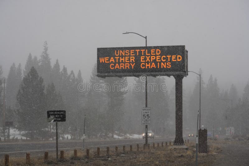 Highway Digital Billboard the Reads, "Unsettled Weather, Carry Chains ...