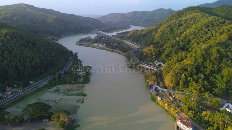 Aerial Drone View of the Serayu River, the Highway and Railroad Tracks ...