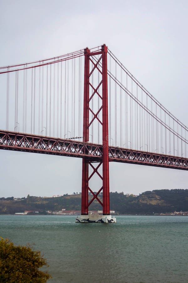 The 25 De Abril Bridge, Lisbon, Portugal Stock Photo - Image of ...