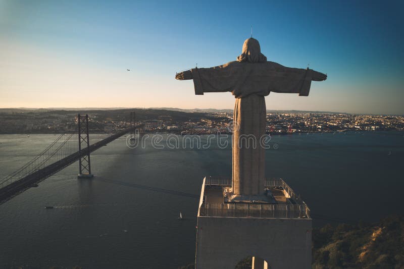 The 25 De Abril Bridge and the Sanctuary of Christ Monument. Lisbon ...