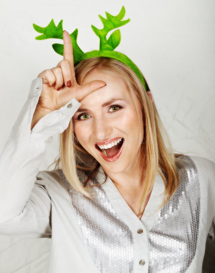 De Hoed Van Het Rendier Op Pretvrouw. Stock Afbeelding - Image of mooi ...