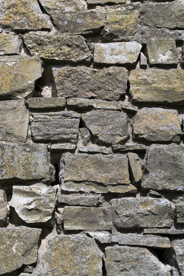 Stenen muur stock foto. Image of buiten, materiaal, gevel - 10365676