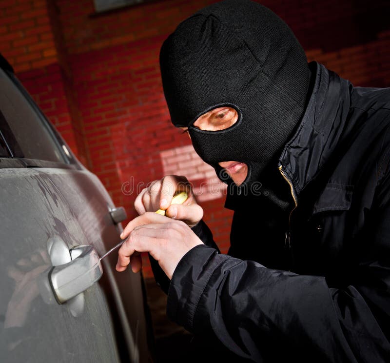 De Rover En De Dief in Een Masker Kapen De Auto Stock Foto - Image of ...