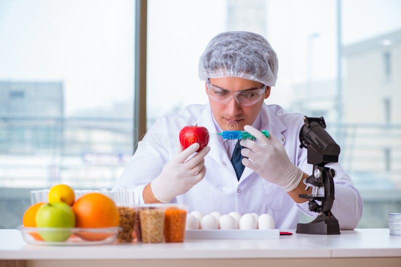De Voeding Deskundige Het Testen Voedingsmiddelen in Laboratorium Stock ...