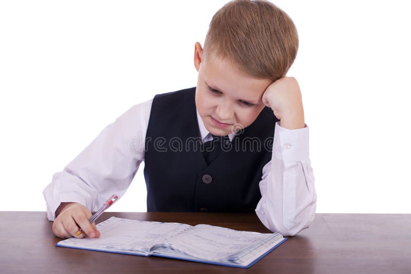 De Zitting Van Tien Jaar Van De Middelbare Schoolstudent Bij Een Bureau ... De Zitting Van Tien Jaar Van De Middelbare Schoolstudent Bij Een Bureau ...
