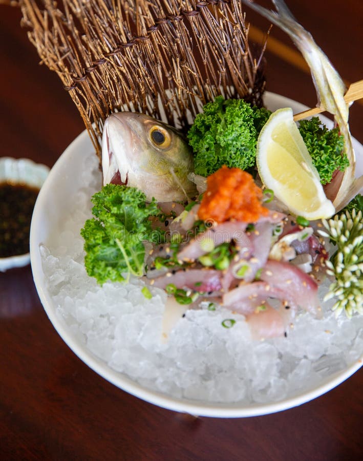 Dead fish head stock photo. Image of sauce, specialty - 307316446