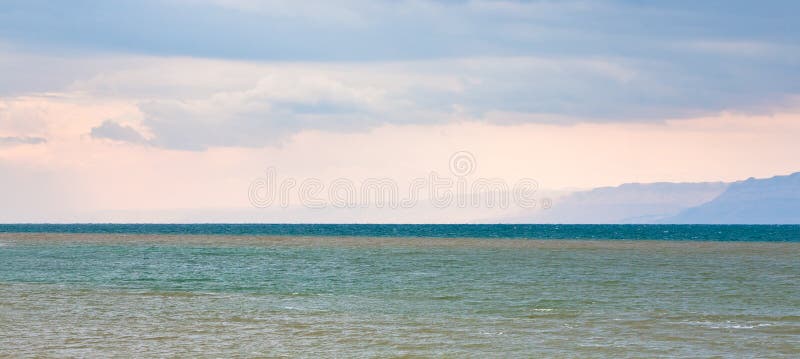 Dead Sea in cloudy day stock image. Image of horizon - 23745633