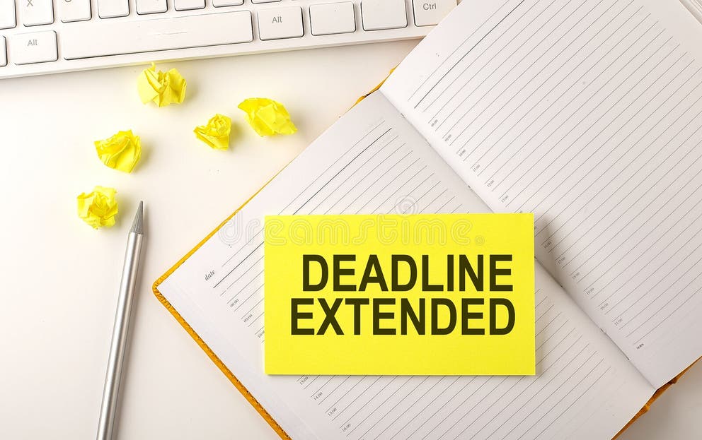DEADLINE EXTENDED Text on Sticker on the Diary with Keyboard and Pencil ...
