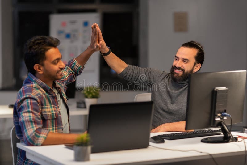 Creative Team Making High Five at Night Office Stock Image - Image of ...