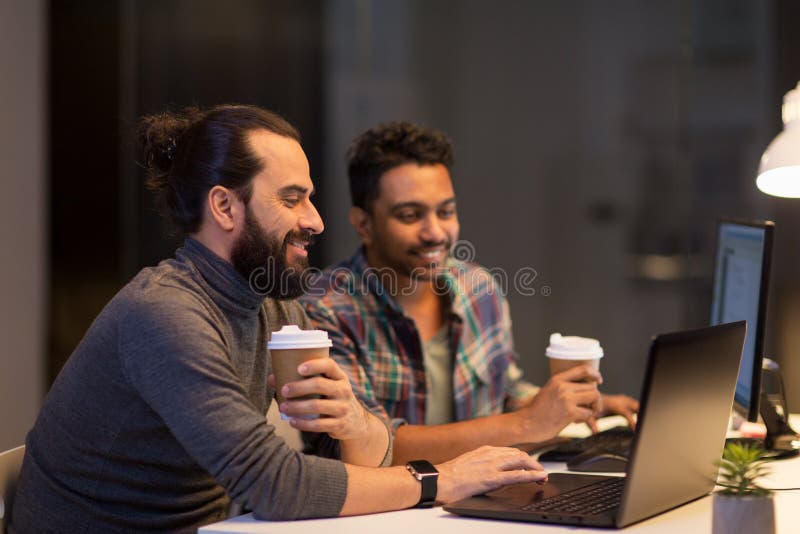 Creative Team Drinking Coffee at Night Office Stock Image - Image of ...