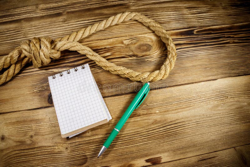 Deadly Loop of Rope and Suicide Note on Wooden Background. Concept of ...