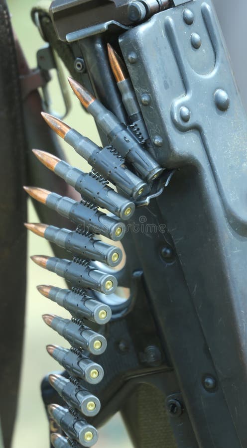 Deadly Row Machine Gun Bullets Stock Image - Image of outdoor, heirloom ...