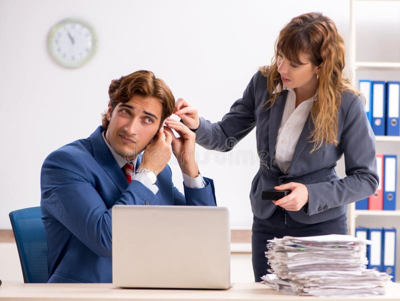 Deaf Employee Using Hearing Aid Talking To Boss Stock Photo - Image of ...