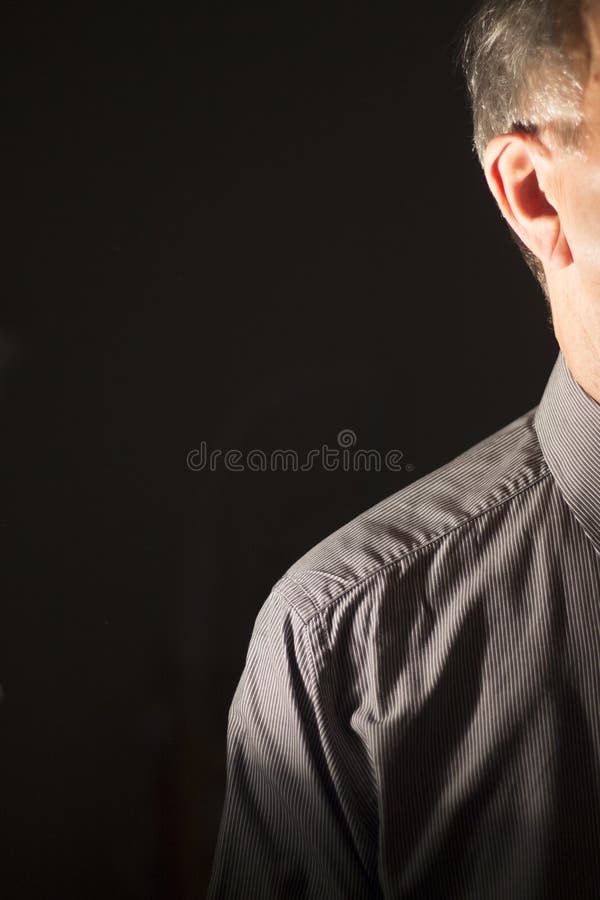 Deaf man hearing aid ear stock photo. Image of male - 130360730