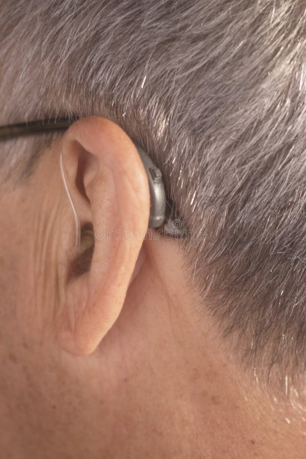 Deaf man hearing aid ear stock image. Image of senior - 132034811