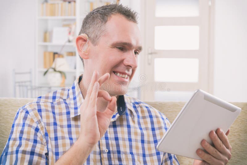 Deaf Man Using Sign Language on the Tablet Stock Image - Image of ...