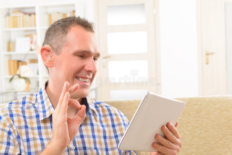 Deaf Man Using Sign Language on the Tablet Stock Photo - Image of ...
