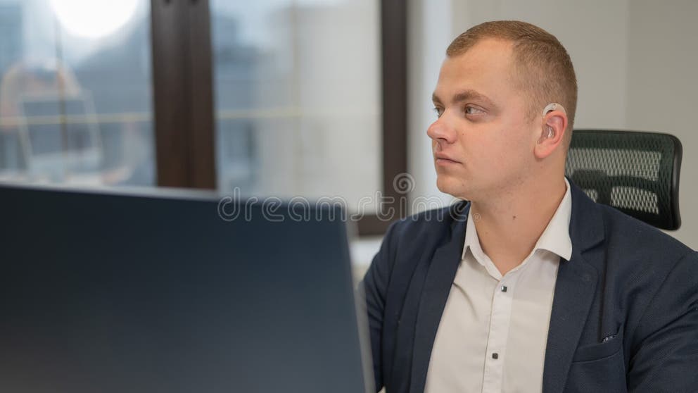 Deaf Man Working on a Computer in the Office. Stock Photo - Image of ...