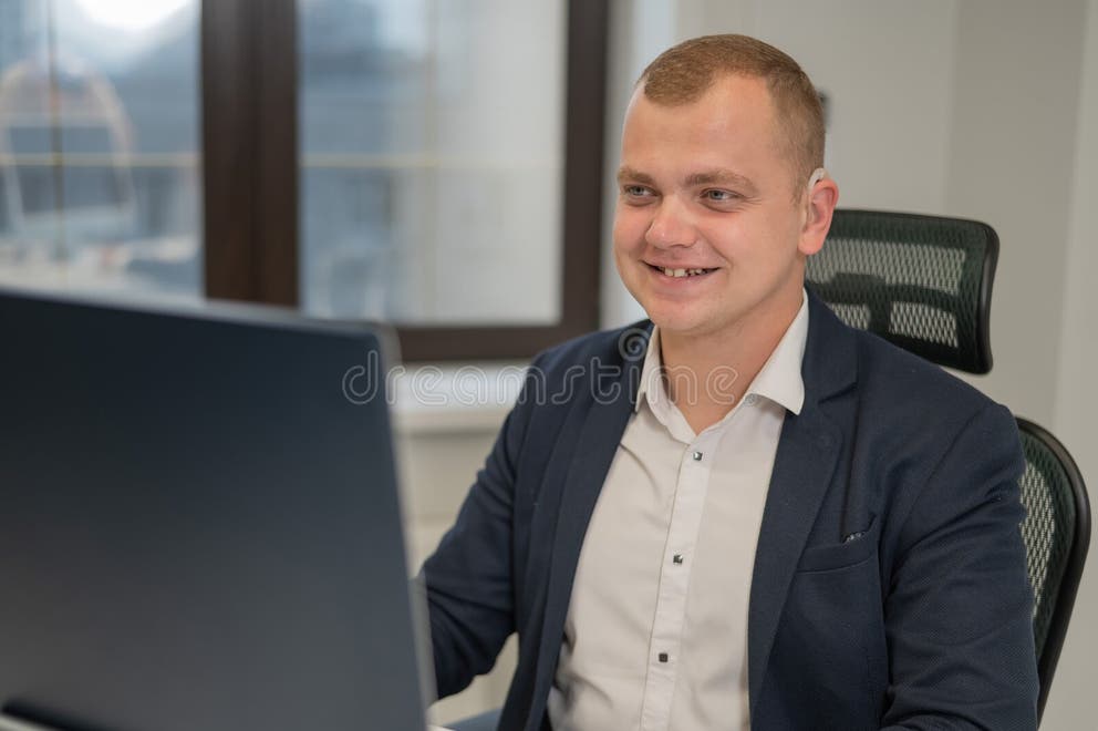 Deaf Man Working on a Computer in the Office. Stock Photo - Image of ...
