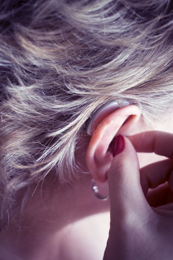 Deaf woman hearing aid ear stock photo. Image of hearing - 120902836