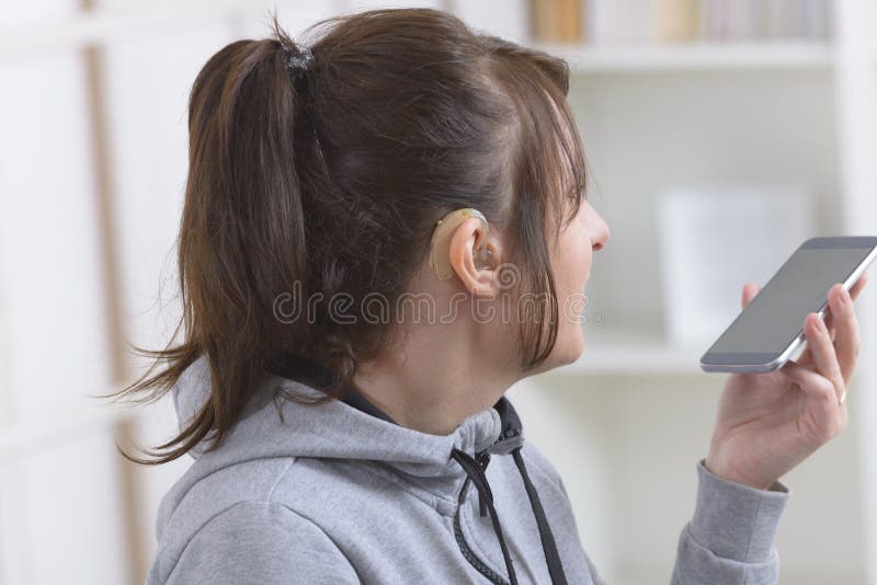 Deaf Woman Using Smartphone Stock Photo - Image of happy, language ...