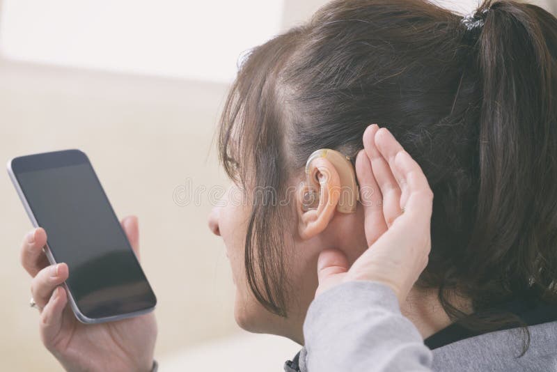 Deaf Woman Using Smartphone Stock Photo - Image of deafness, deaf ...