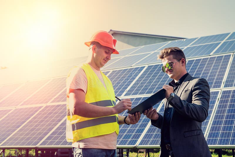 Deal of Installation of Solar Panels between Worker and Customer Stock ...