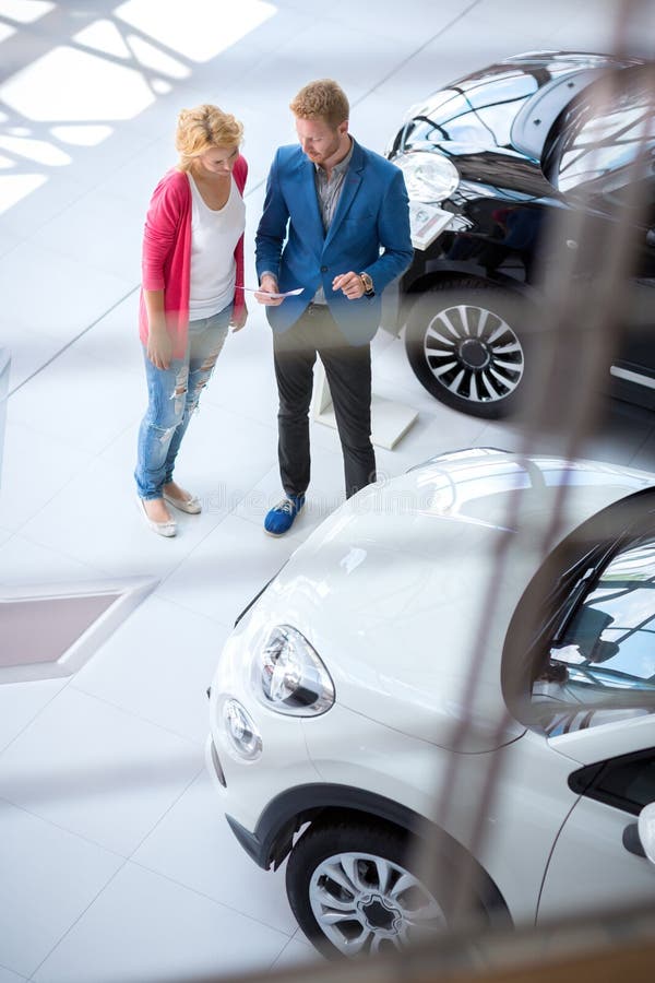 Dealer with a Client in a Dealership Stock Photo - Image of male, agent ...