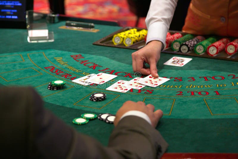 Dealer Puts Down a Card on Blackjack Table Stock Image - Image of cloth ...